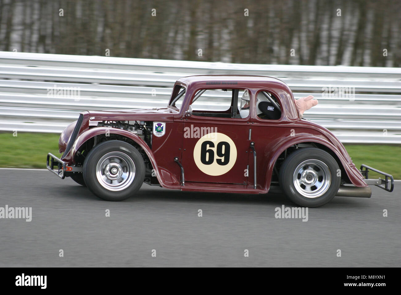 Legend coupe racing in the snow Stock Photo - Alamy