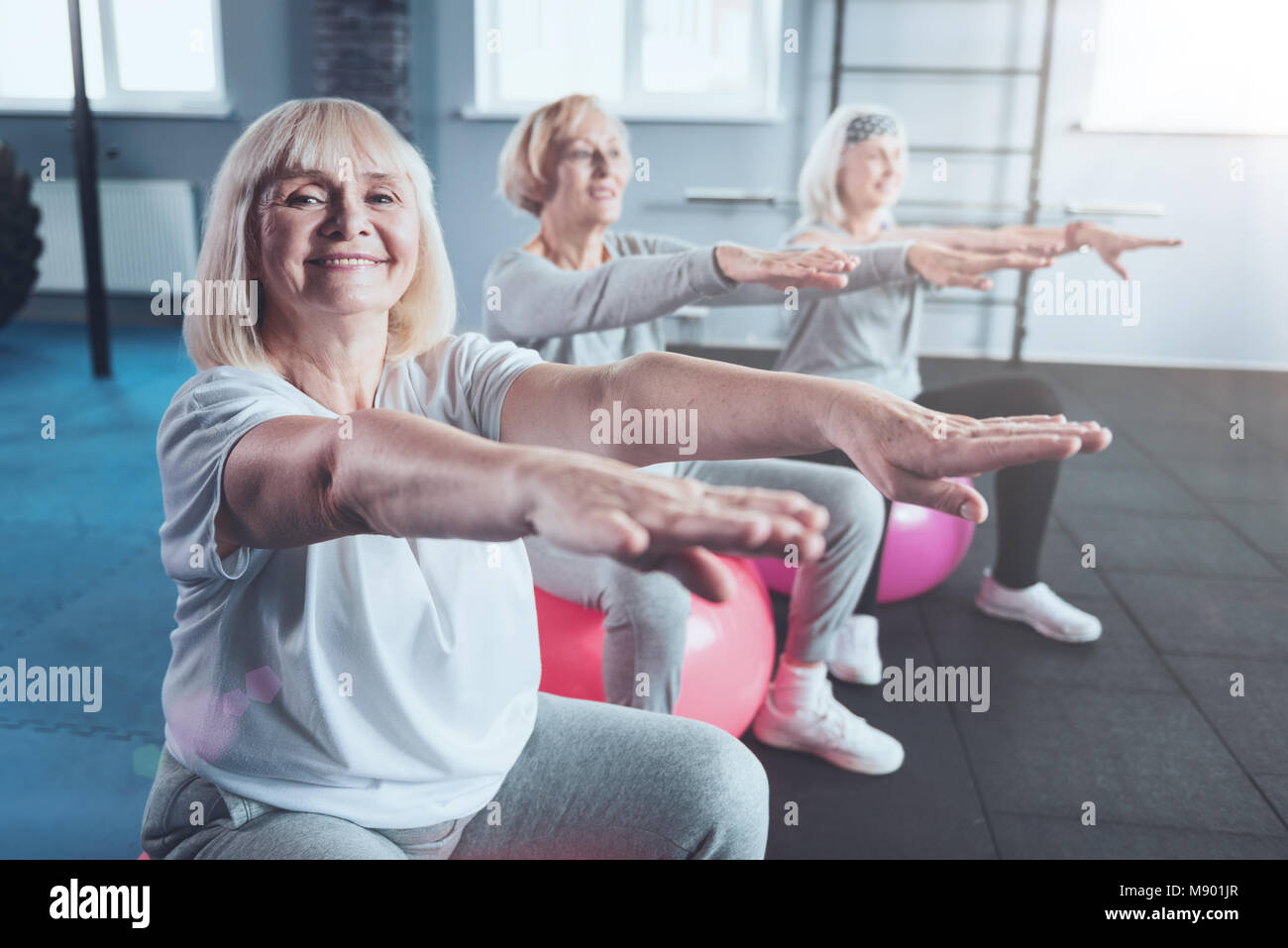 Mature ladies enjoying training session at gym Stock Photo - Alamy