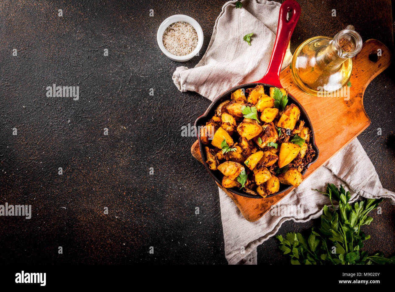 Indian food, Bombay Potatoes on dark rusty background copy space top ...