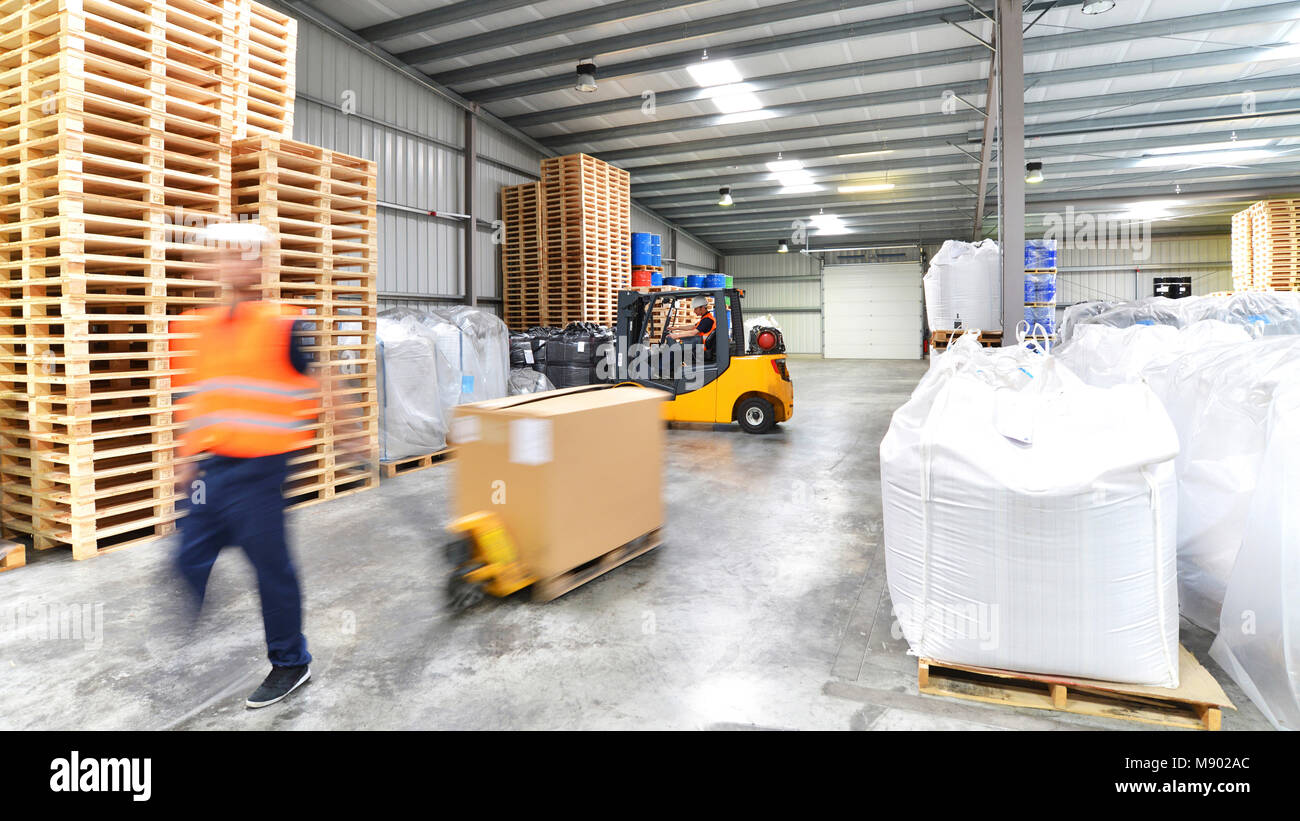 transport and logistics in a warehouse of a forwarding agent - worker ...