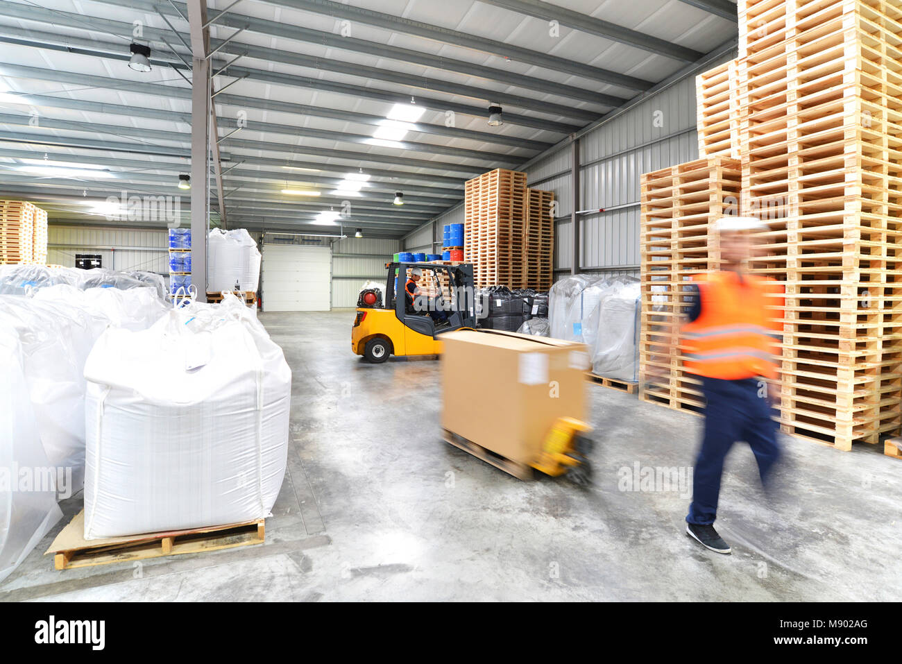 transport and logistics in a warehouse of a forwarding agent - worker ...