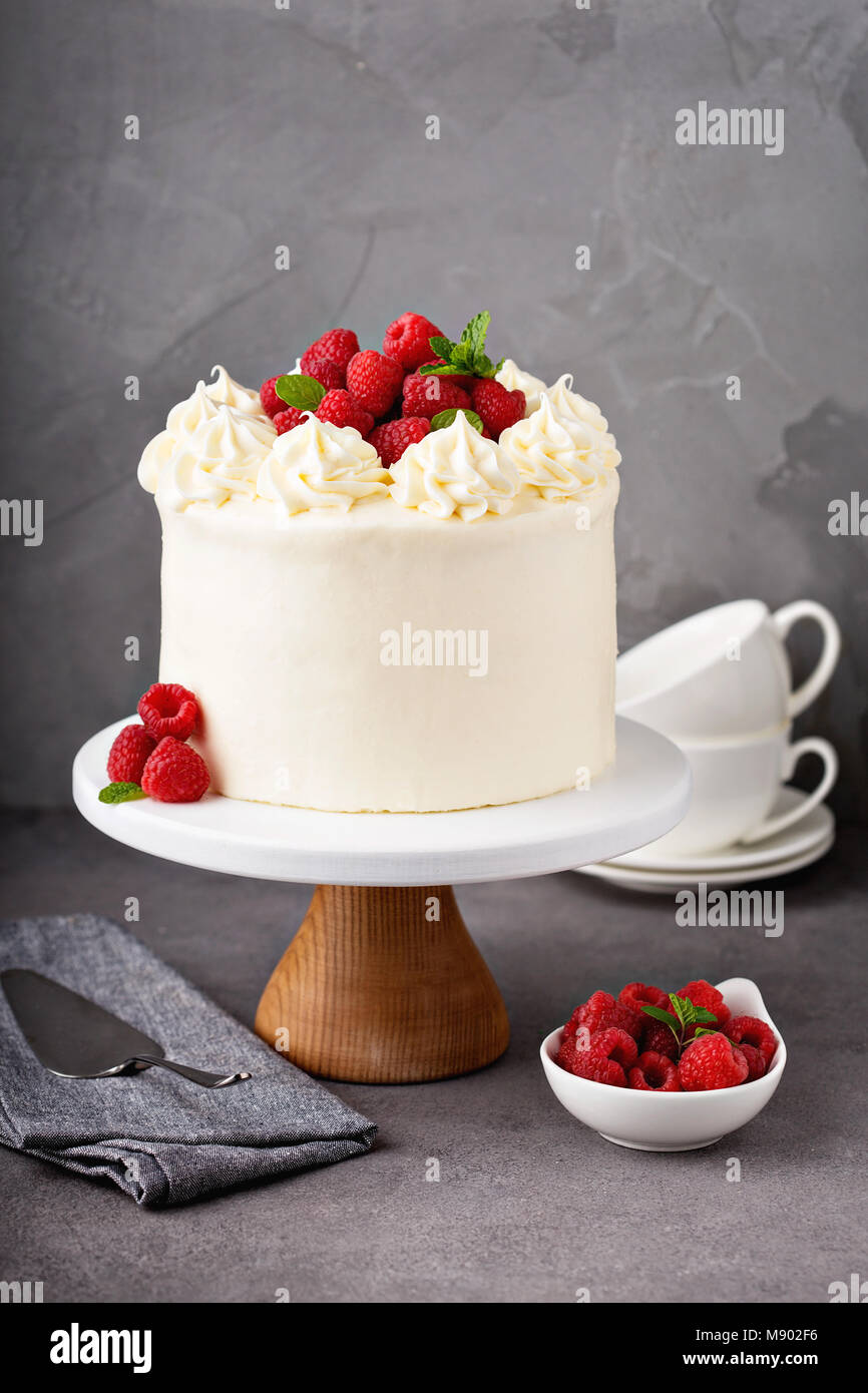 Vanilla raspberry cake with white frosting Stock Photo - Alamy