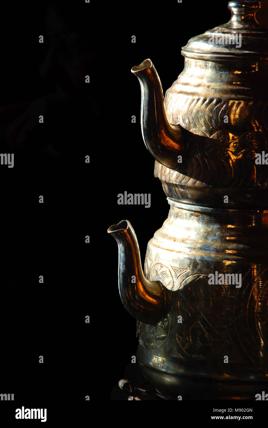 Traditional Turkish tea pot on black background Stock Photo - Alamy
