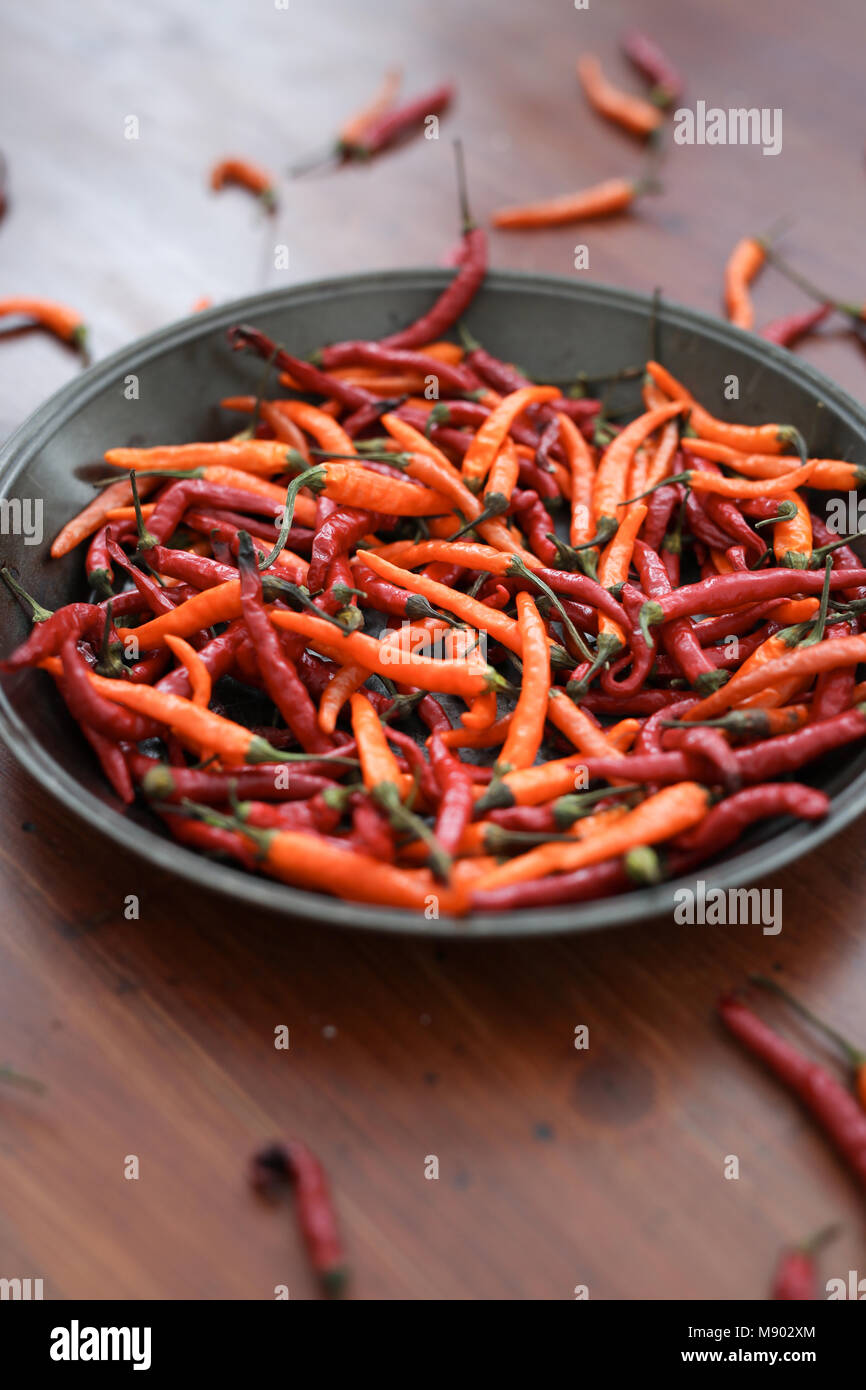 Red chili pepper on the table Stock Photo - Alamy