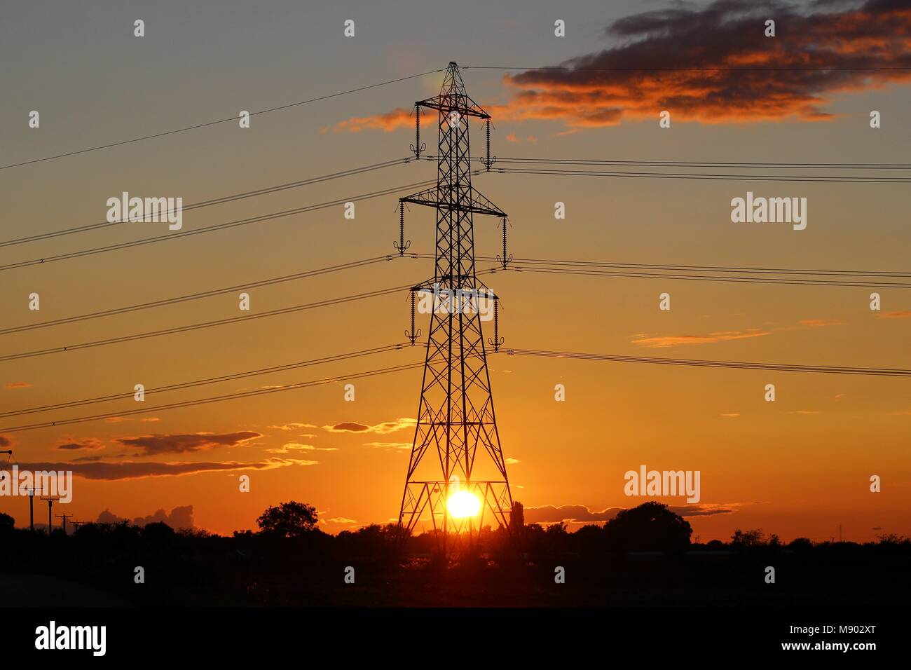 Sunset between electricity Pylons, Yorkshire, England, UK Stock Photo ... Sunset between electricity Pylons, Yorkshire, England, UK Stock Photo ...