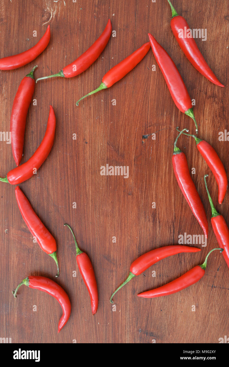 Red chili pepper on the table Stock Photo - Alamy
