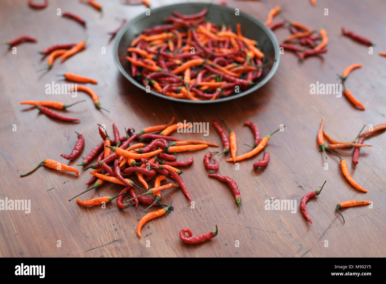 Red chili pepper on the table Stock Photo - Alamy