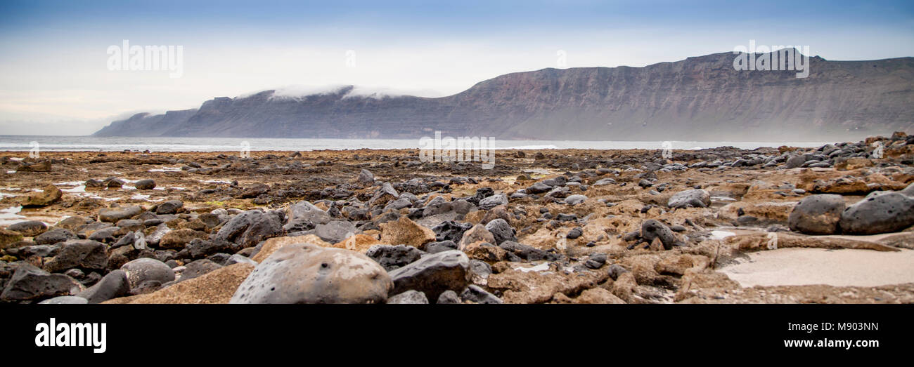lanzarote, canary islands, view on famara, surfing village Stock Photo ...
