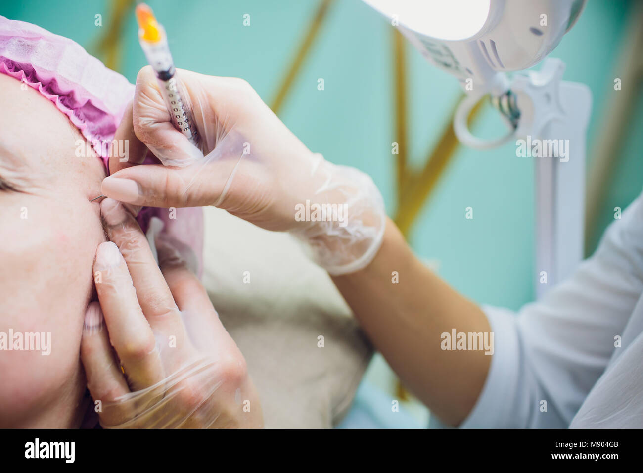 Professional holding the needle cannula on hand. Closeup. Female Stock ...