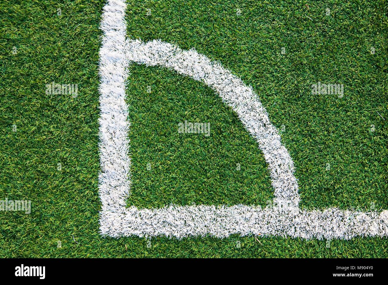 Corner of a football (soccer) field is made from synthetic lawn Stock ...