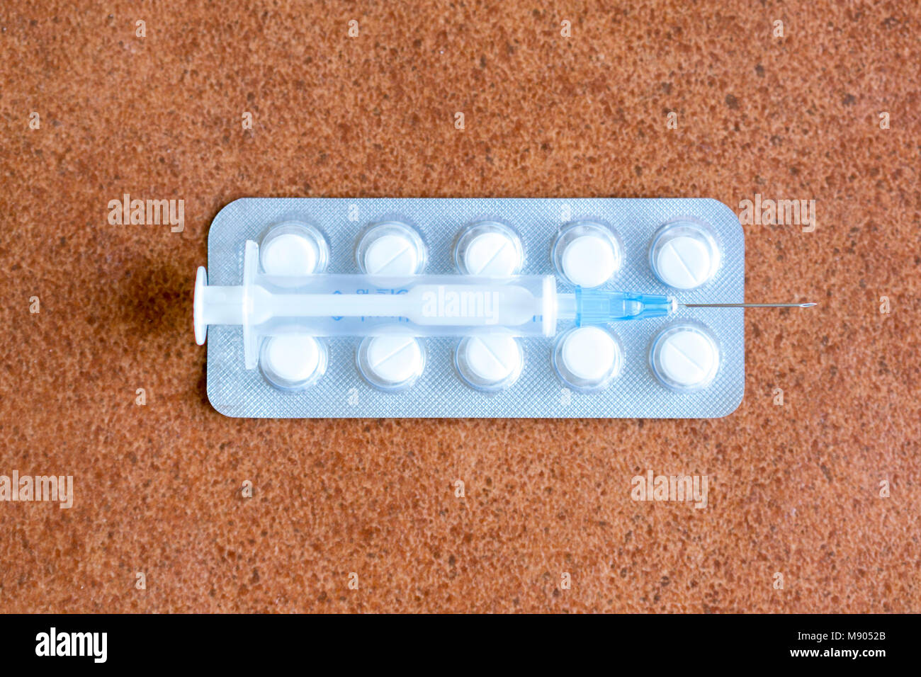 Medical bottles tablets syringe hi-res stock photography and images - Alamy