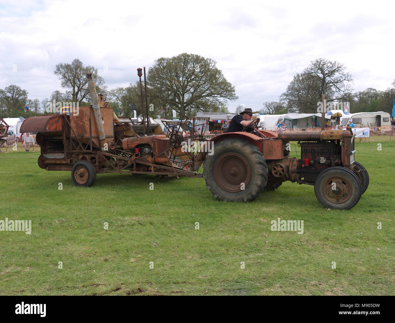 Vintage tractor and harvester displaying at Stradsett steam and vintage ...