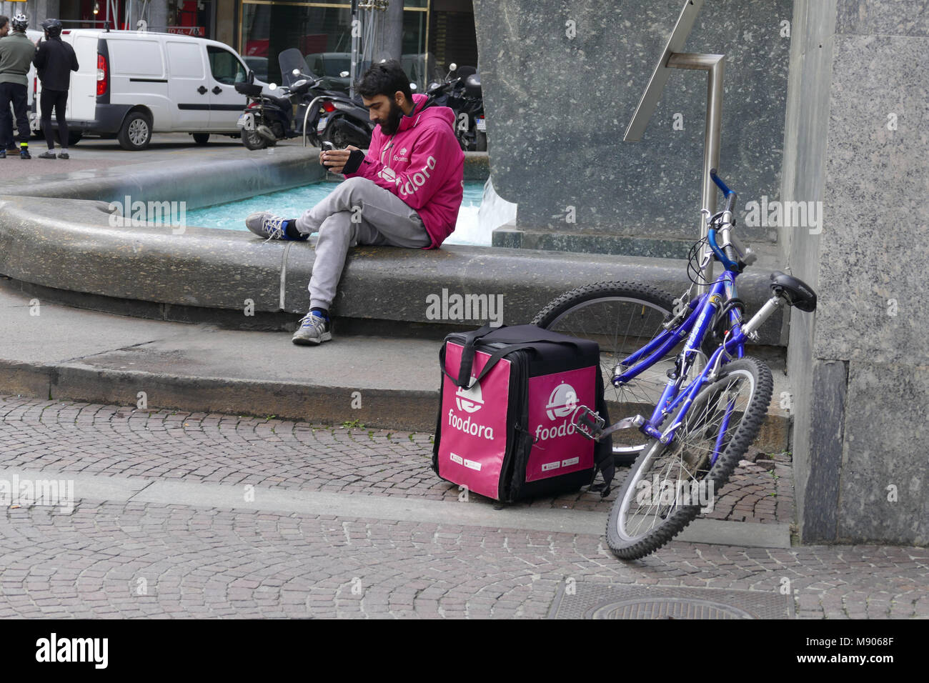Food delivery worker hi-res stock photography and images - Alamy