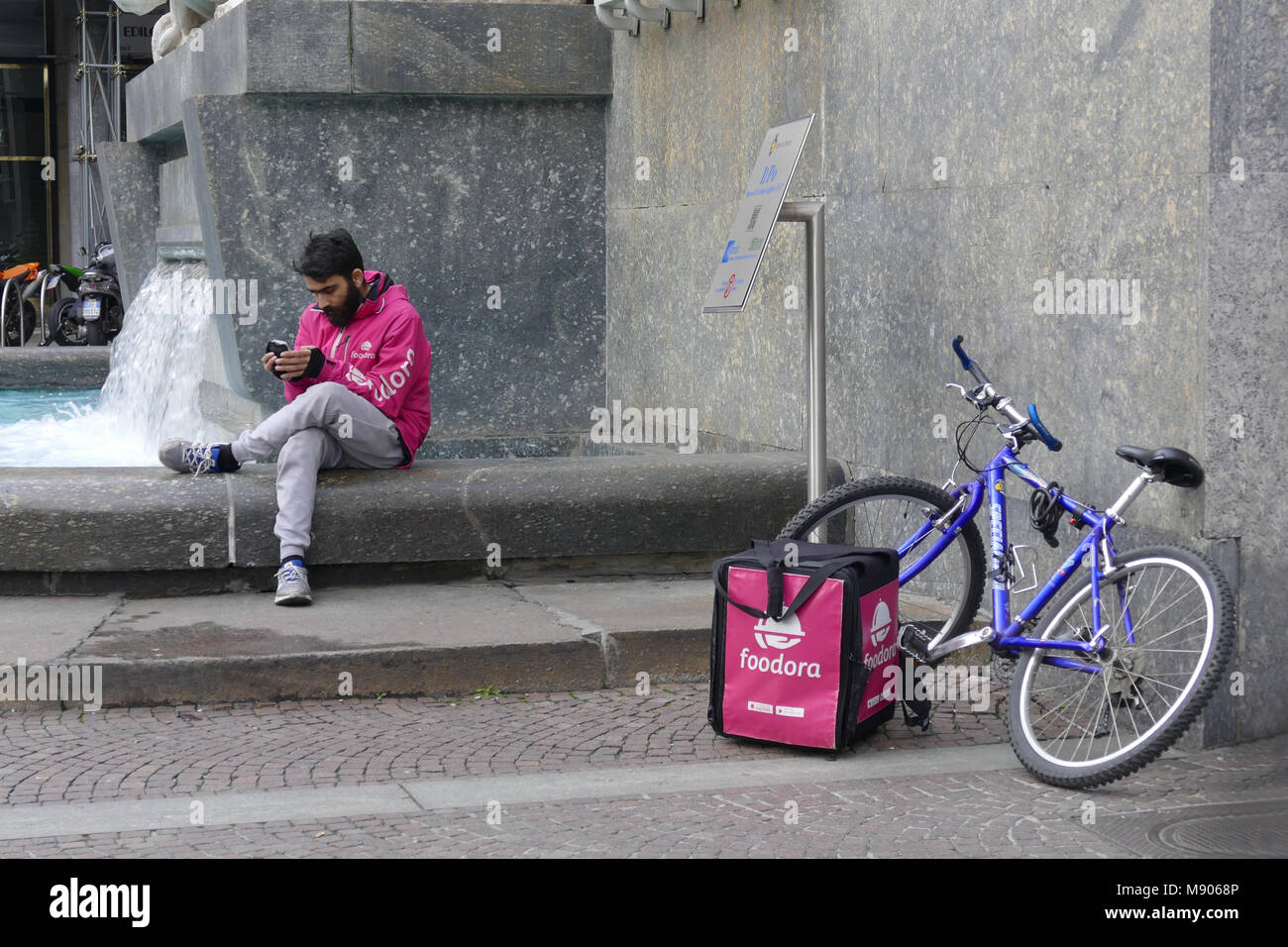 Food delivery worker hi-res stock photography and images - Alamy