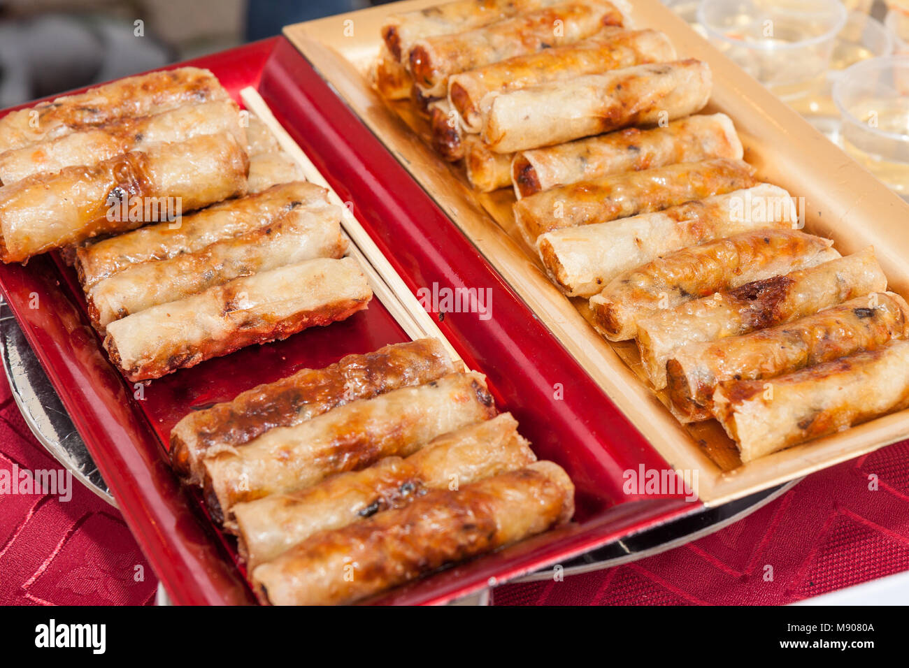 Demonstration Cooking, fried spring rolls on plastic coaster Stock ...