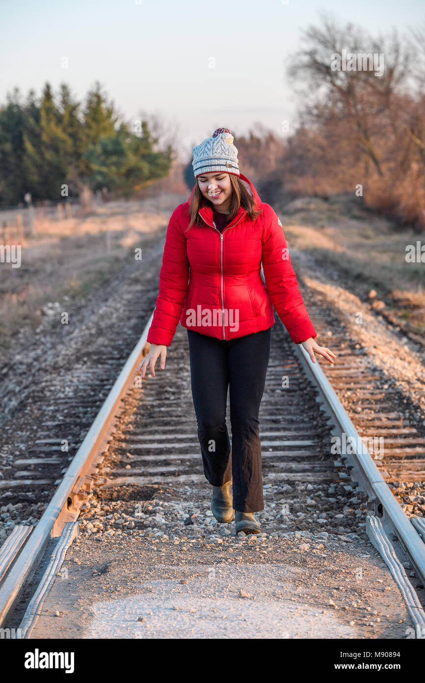 Girl on train tracks hi-res stock photography and images - Alamy