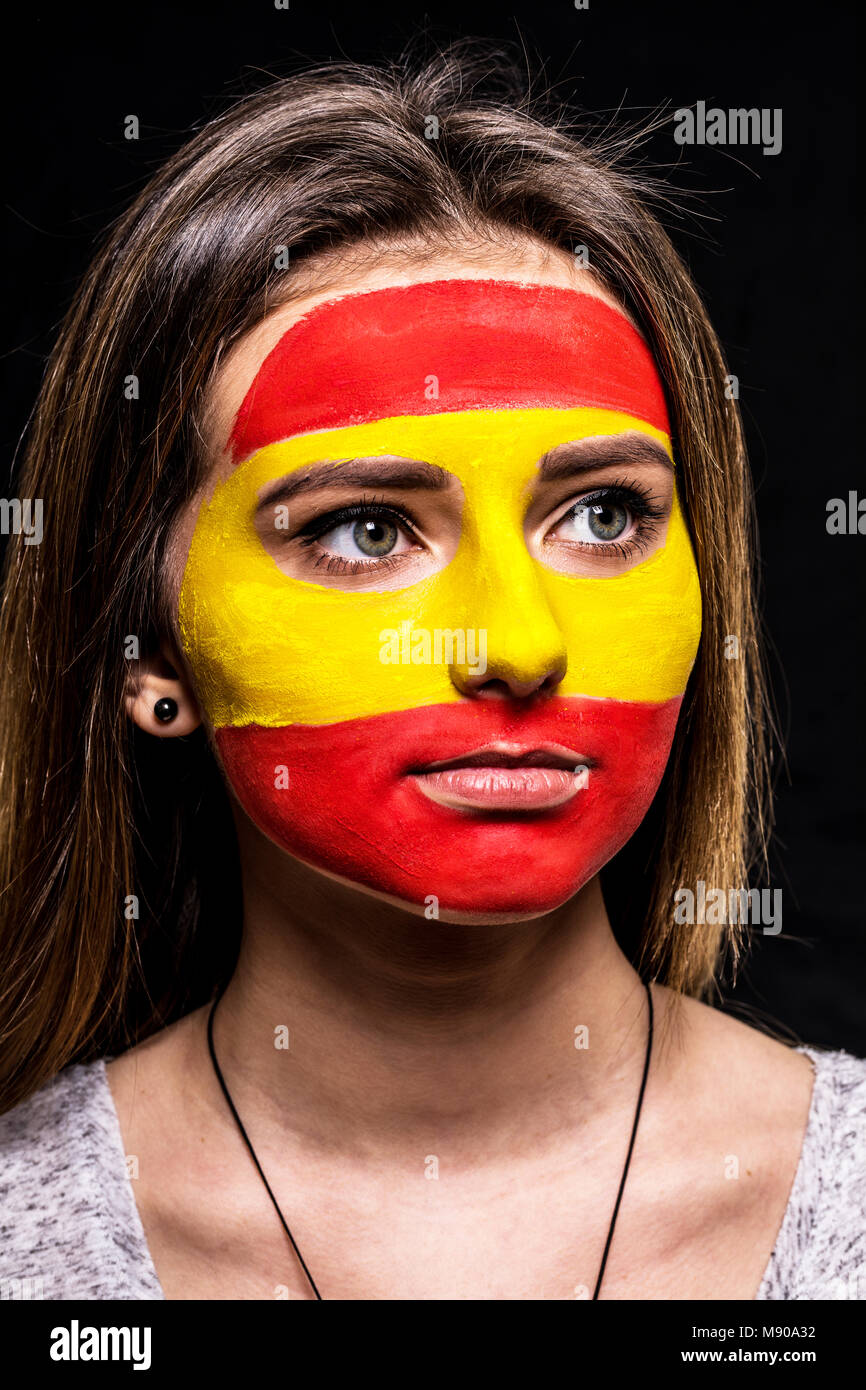Portrait of woman face supporter fan of Spain national team with ...