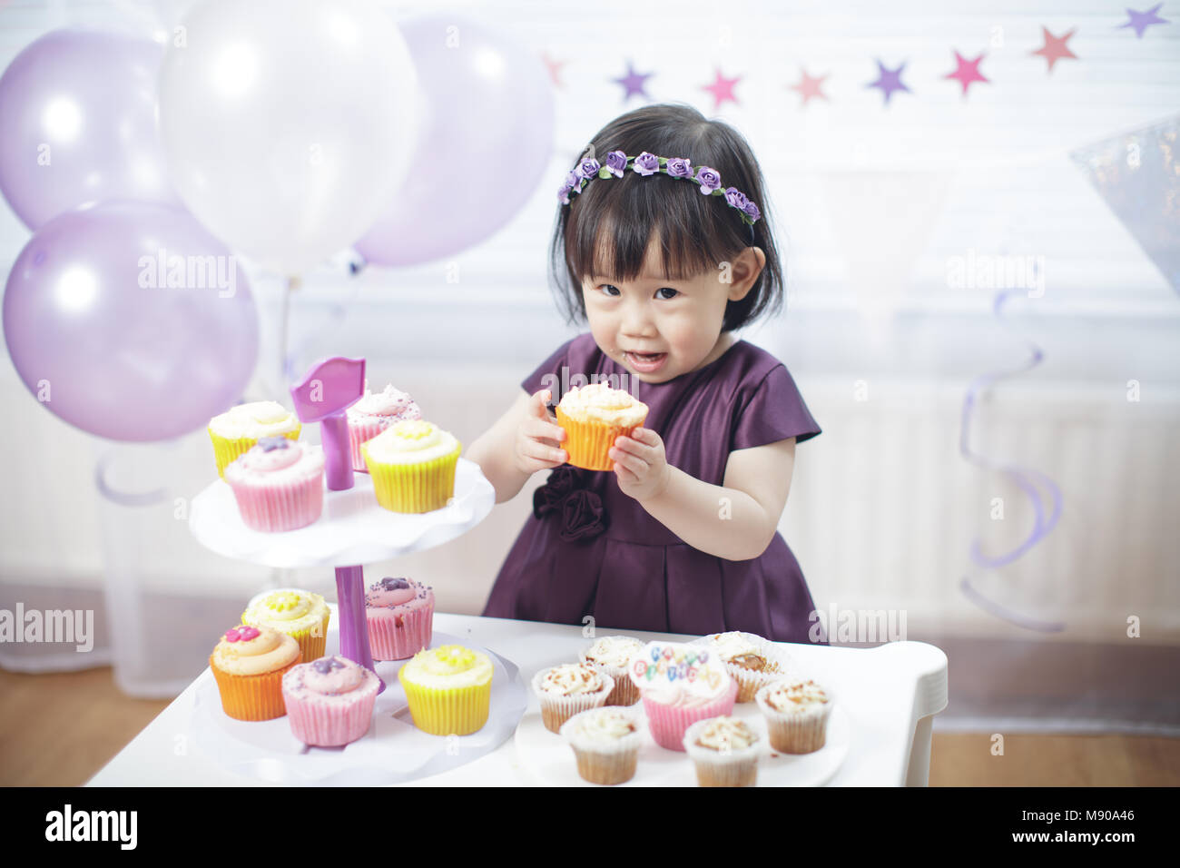 Baby girl celebrate her second birthday Stock Photo - Alamy