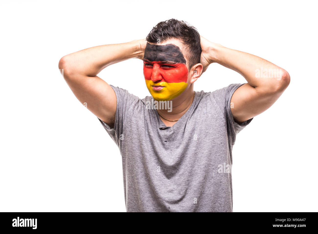 Handsome man supporter fan of Germany national team painted flag face ...
