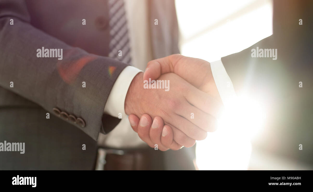 Business people shaking hands after good deal Stock Photo - Alamy