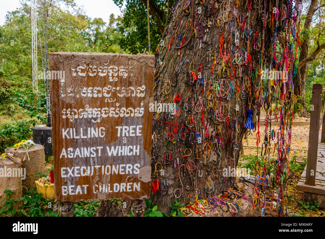 Colourful bracelets left by visitors at a tree used by the Khymer Rouge ...
