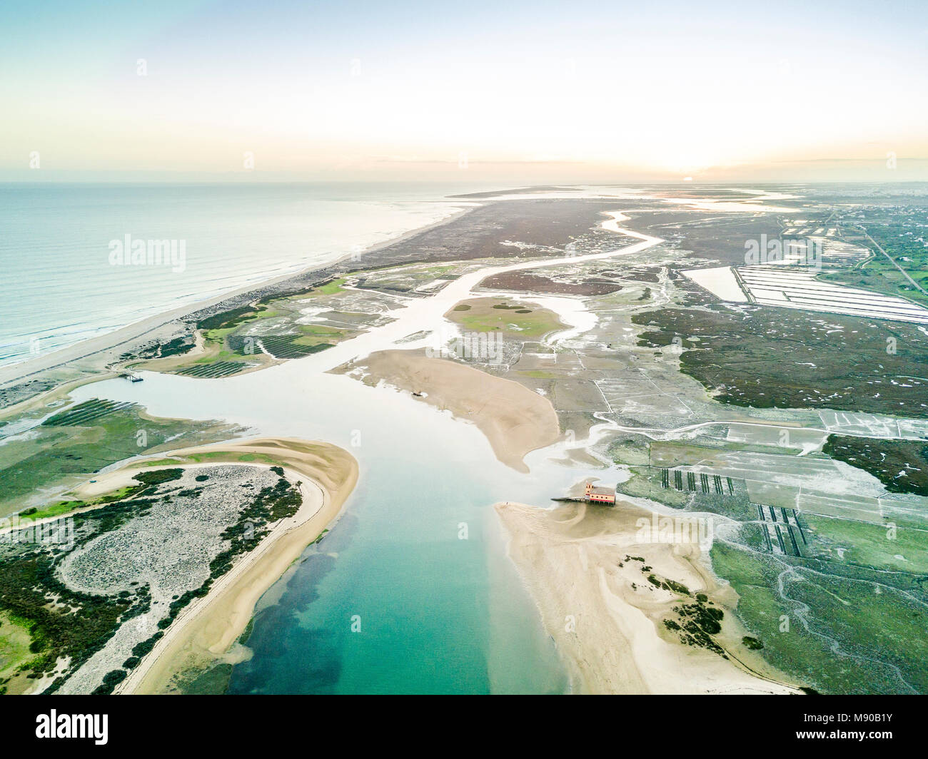 Aerial view of unique Ria Formosa at sunset in Fuseta, Algarve ...