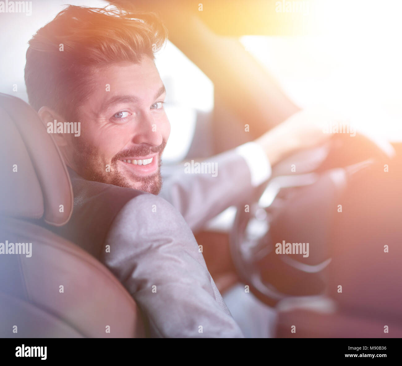 The young man behind the wheel Stock Photo - Alamy