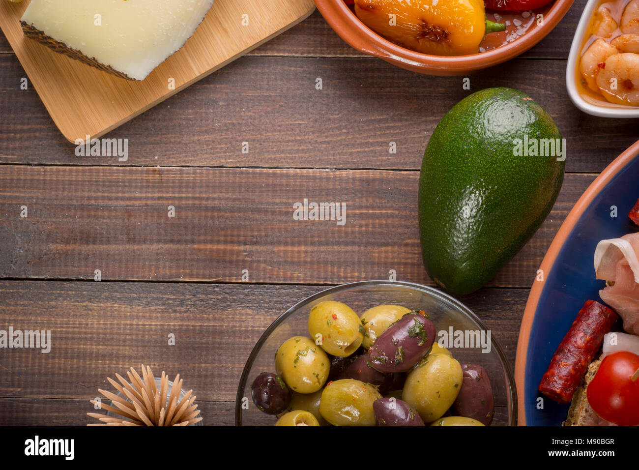 Mixed spanish tapas food starters on table. Open sandwiches, shrimps ...