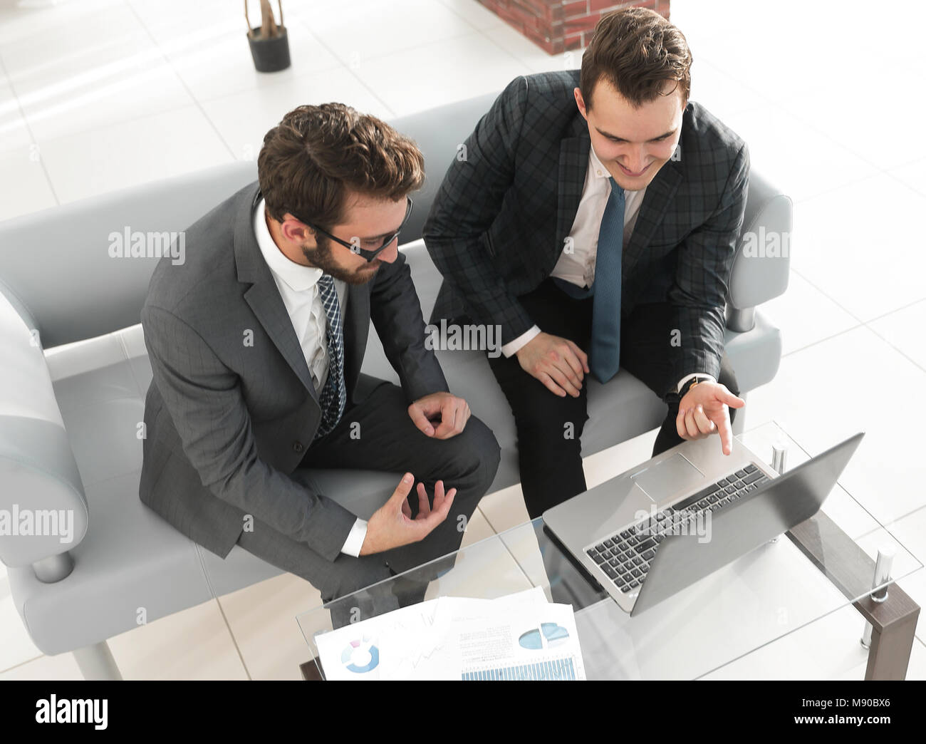 people and technology.employees with laptop in the office Stock Photo ...