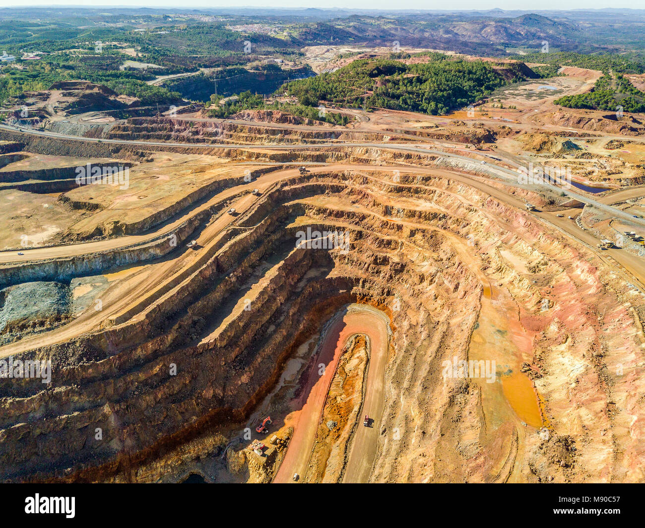 Aerial view of huge, modern open pit mine in Minas de Riotinto ...