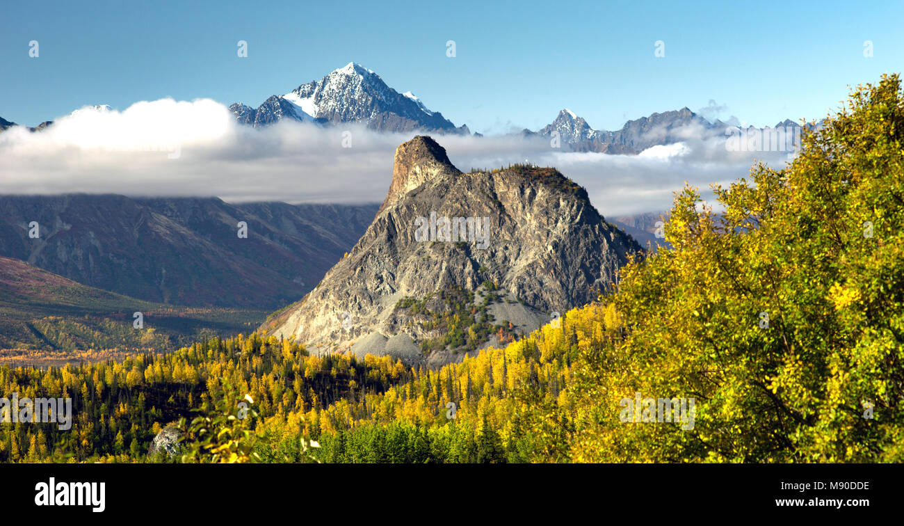 Mountains in the Chugach Range stand above the clouds rising from the ...
