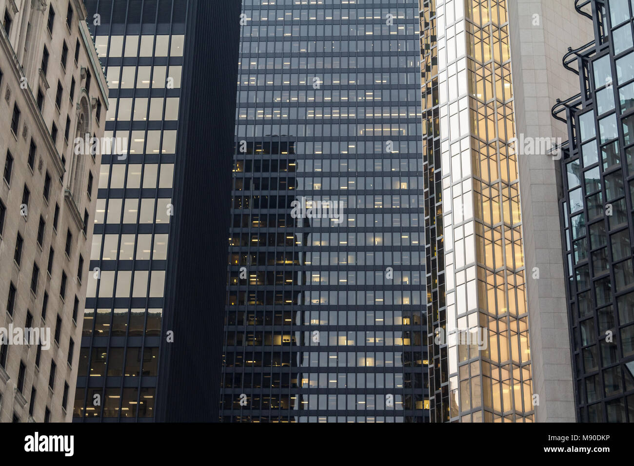 Skyscrapers reflecting in the mirror like windows of another modern ...