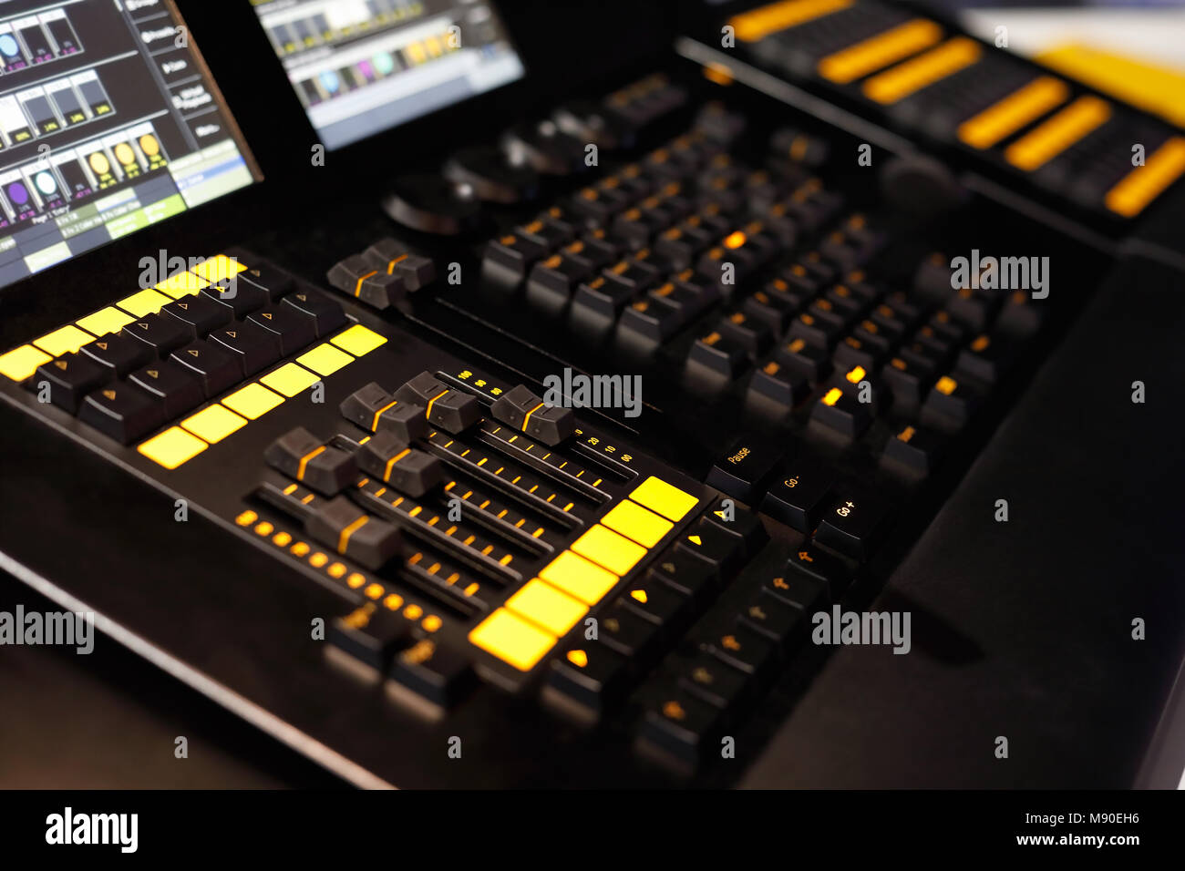 Closeup of lighting desk used in lighting design to control stage ...