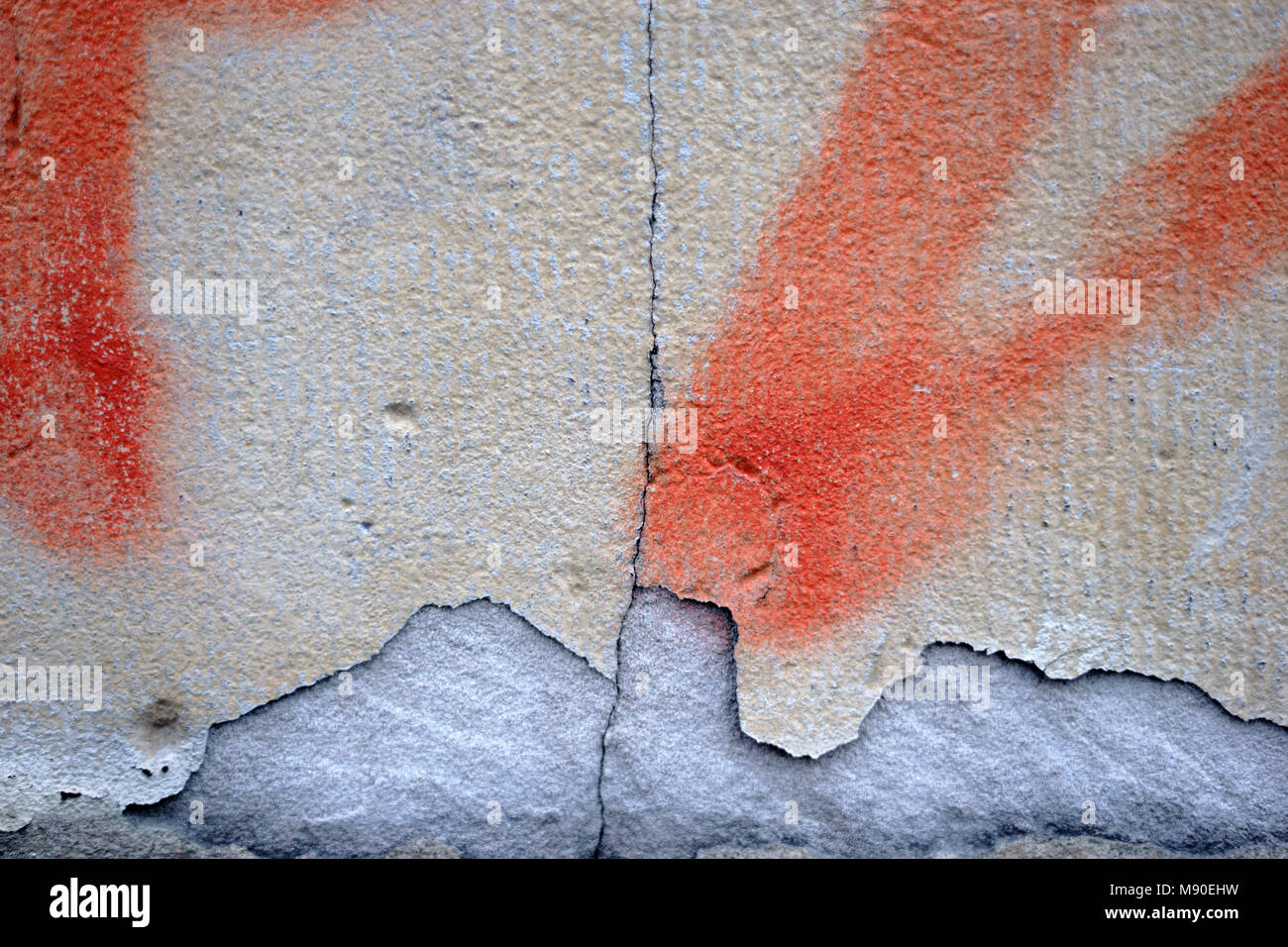 The close-up of a wall with a chipped and painted plaster layer Stock ...
