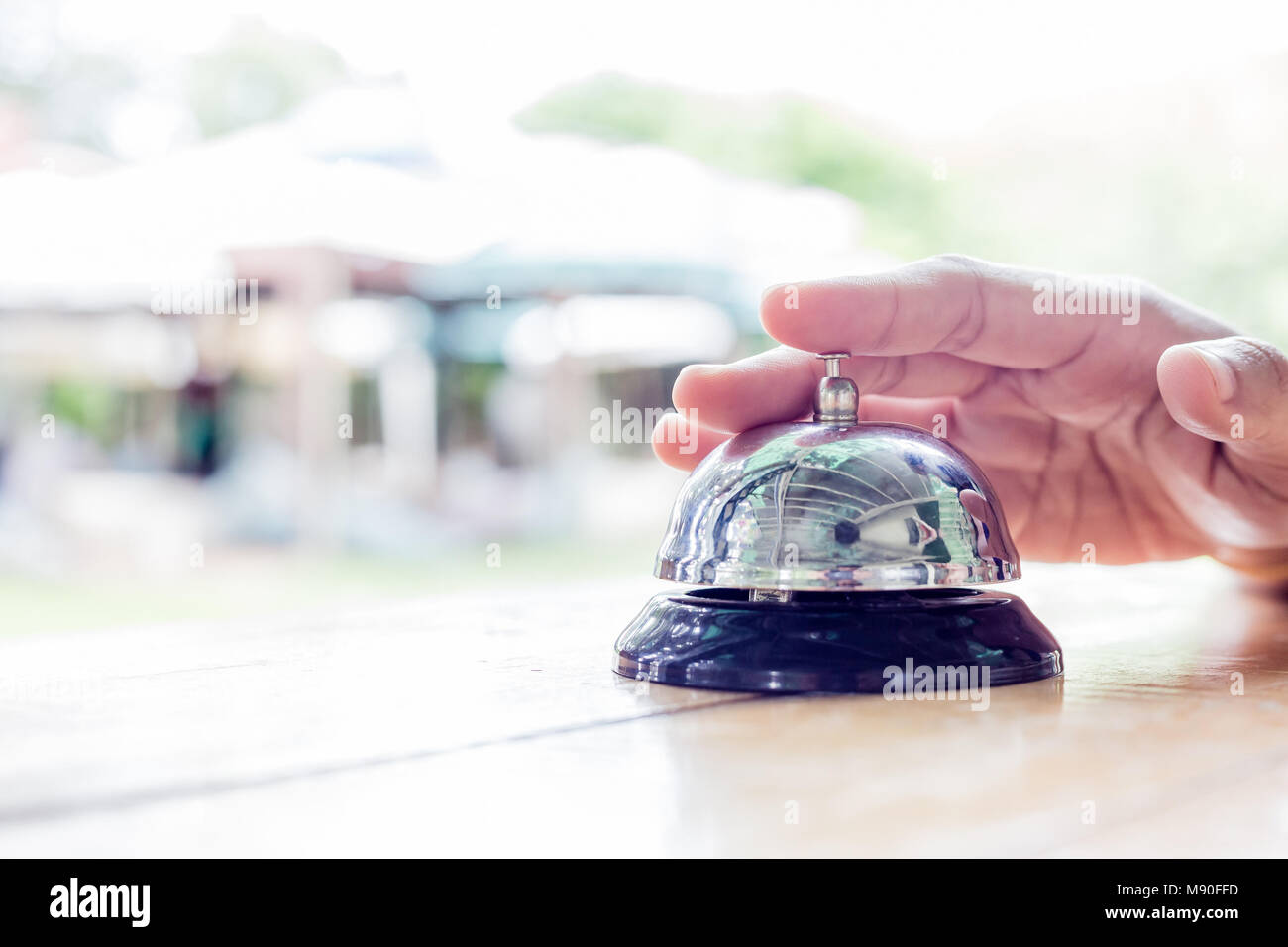 Service Bell. Person using their finger to ring a counter bell.ฃ Stock ...