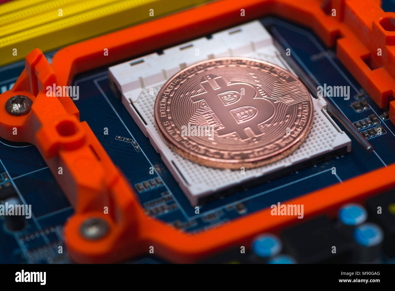 Bitcoin digital currency, bit-coin on motherboard or electronic board ...