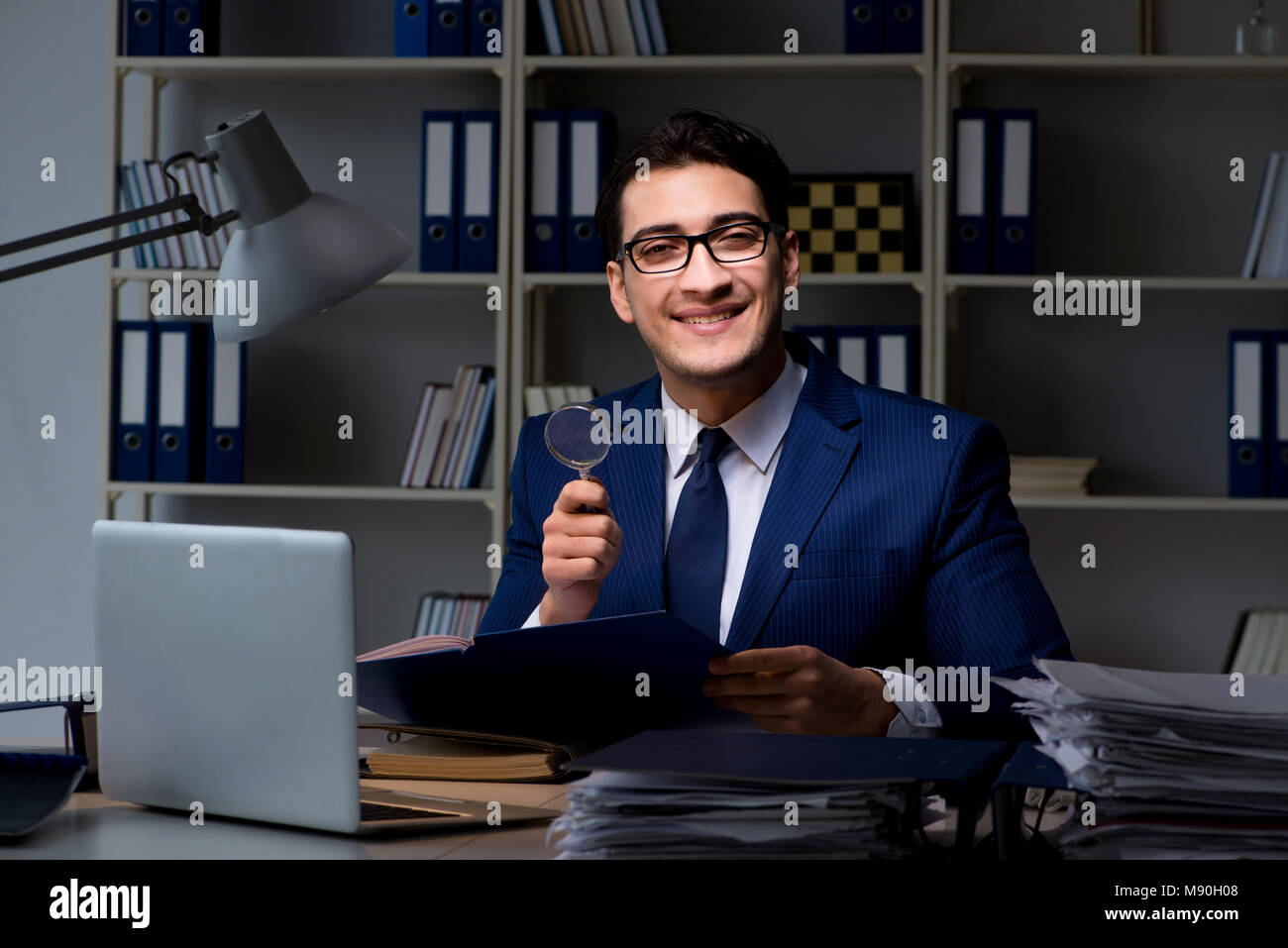 Auditor looking for errors in financial reporting for company Stock ...