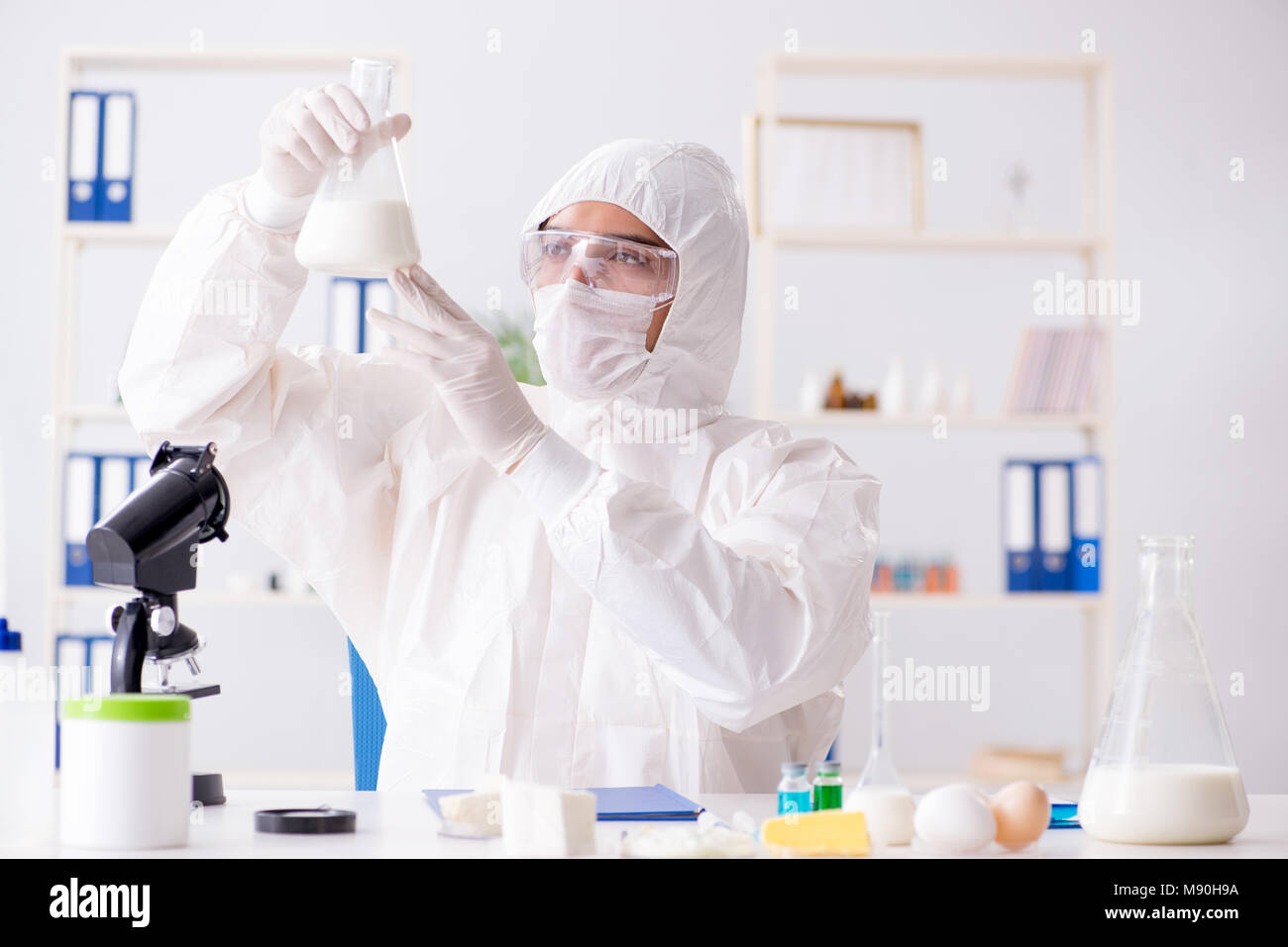 Scientist testing milk hi-res stock photography and images - Alamy