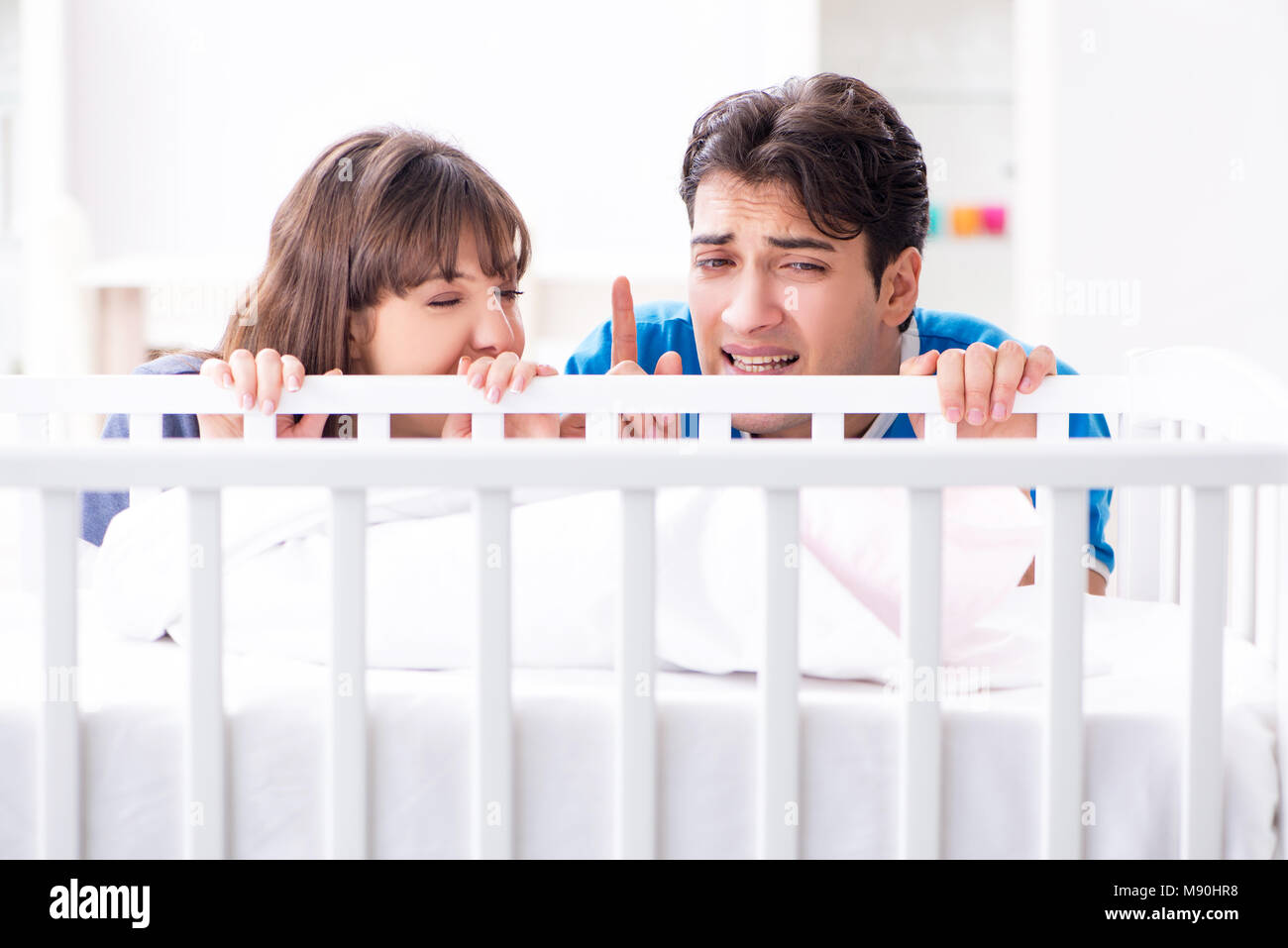 Crying baby stressed parents hi-res stock photography and images - Alamy