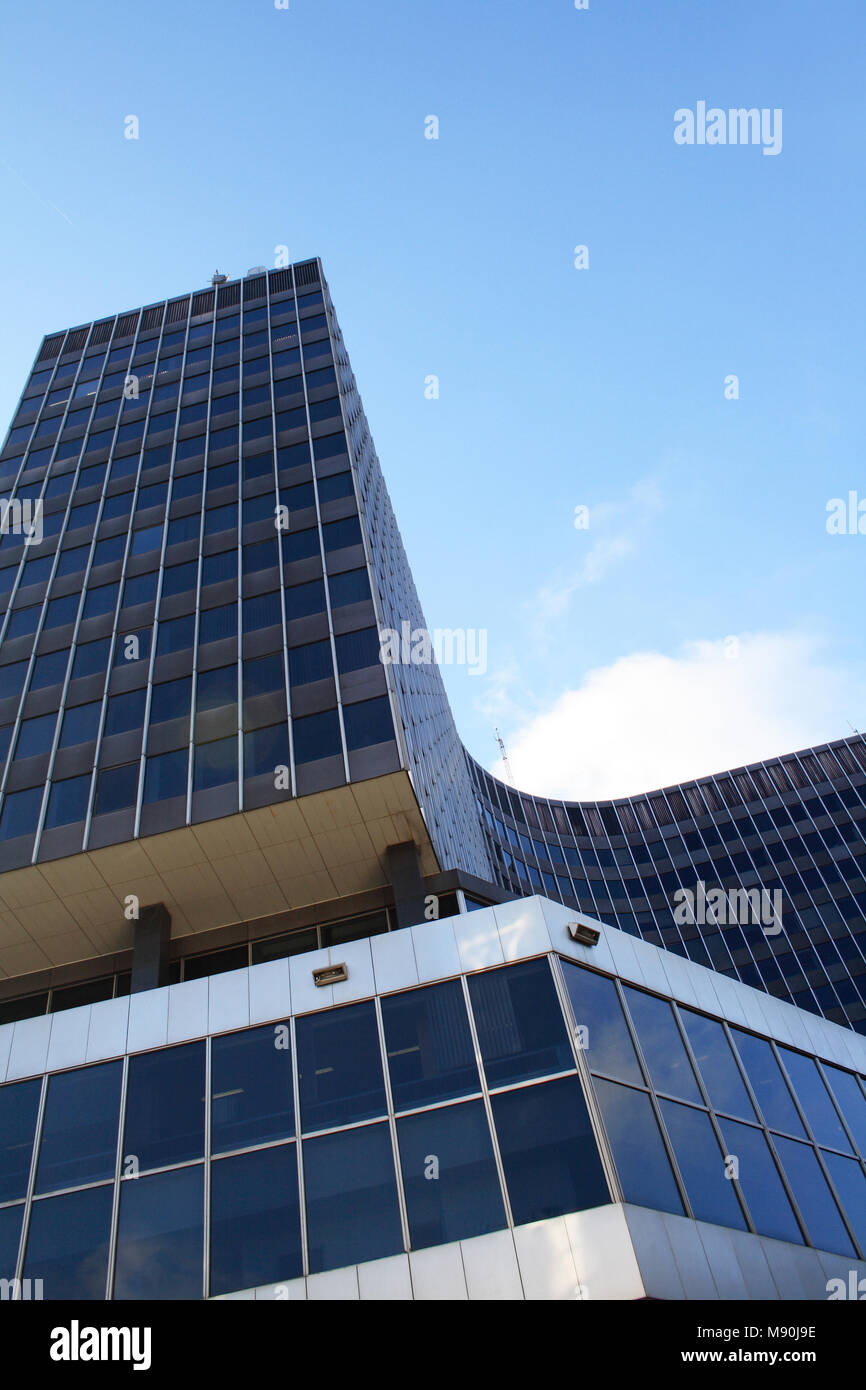 Nice modern glass and steel building on blue sky background Stock Photo ...