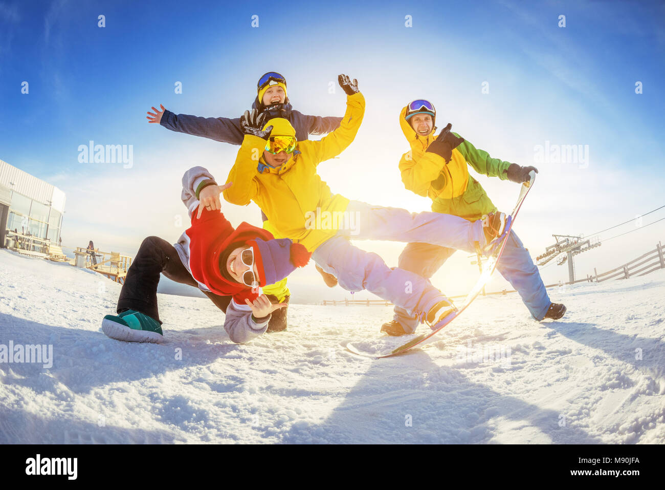 Happy friends at ski resort are having fun Stock Photo - Alamy