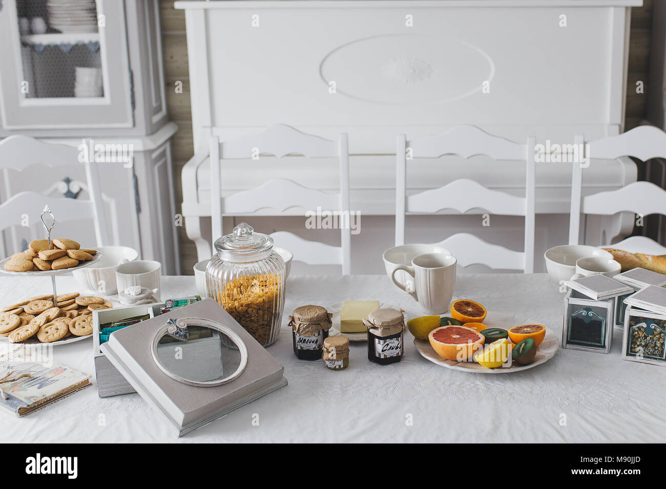 Having morning family breakfast on the kitchen top view Stock Photo - Alamy