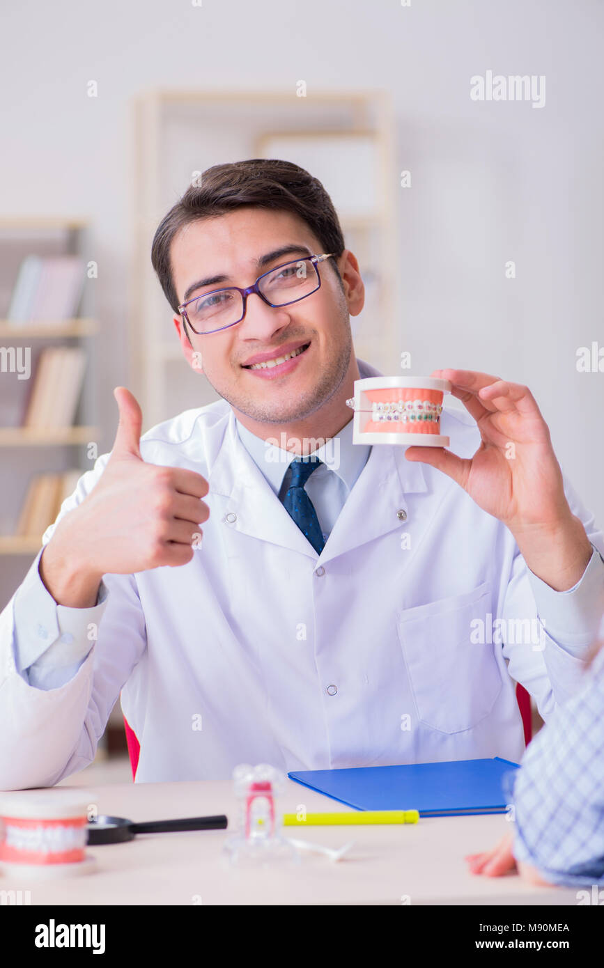 Patient visiting dentist doctor for preliminary appointment Stock Photo ...