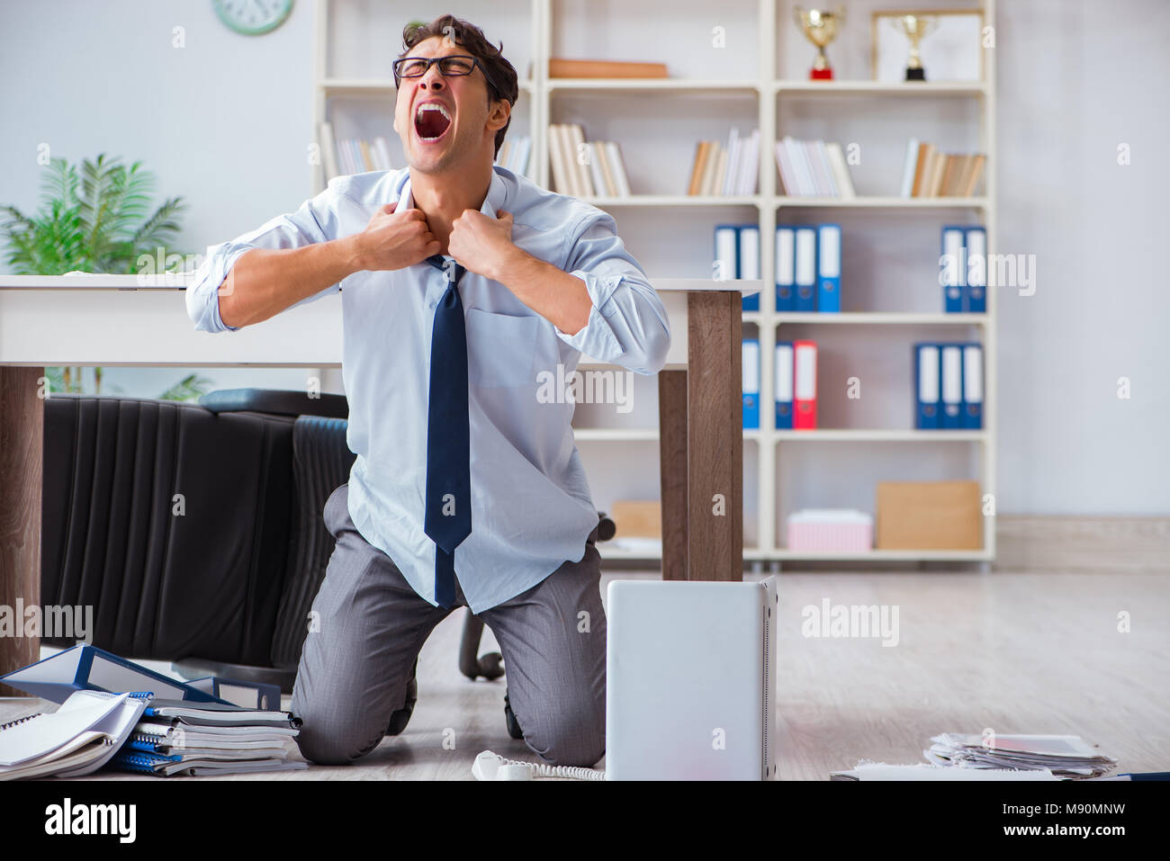 Bankrupt businessman angry in the office floor Stock Photo - Alamy