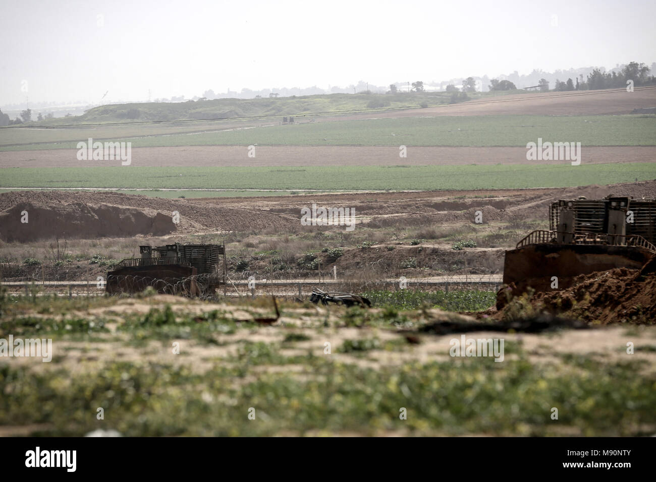 Jabalya, Gaza. 20th Mar, 2018. An Israeli D9 bulldozer patrols along ...