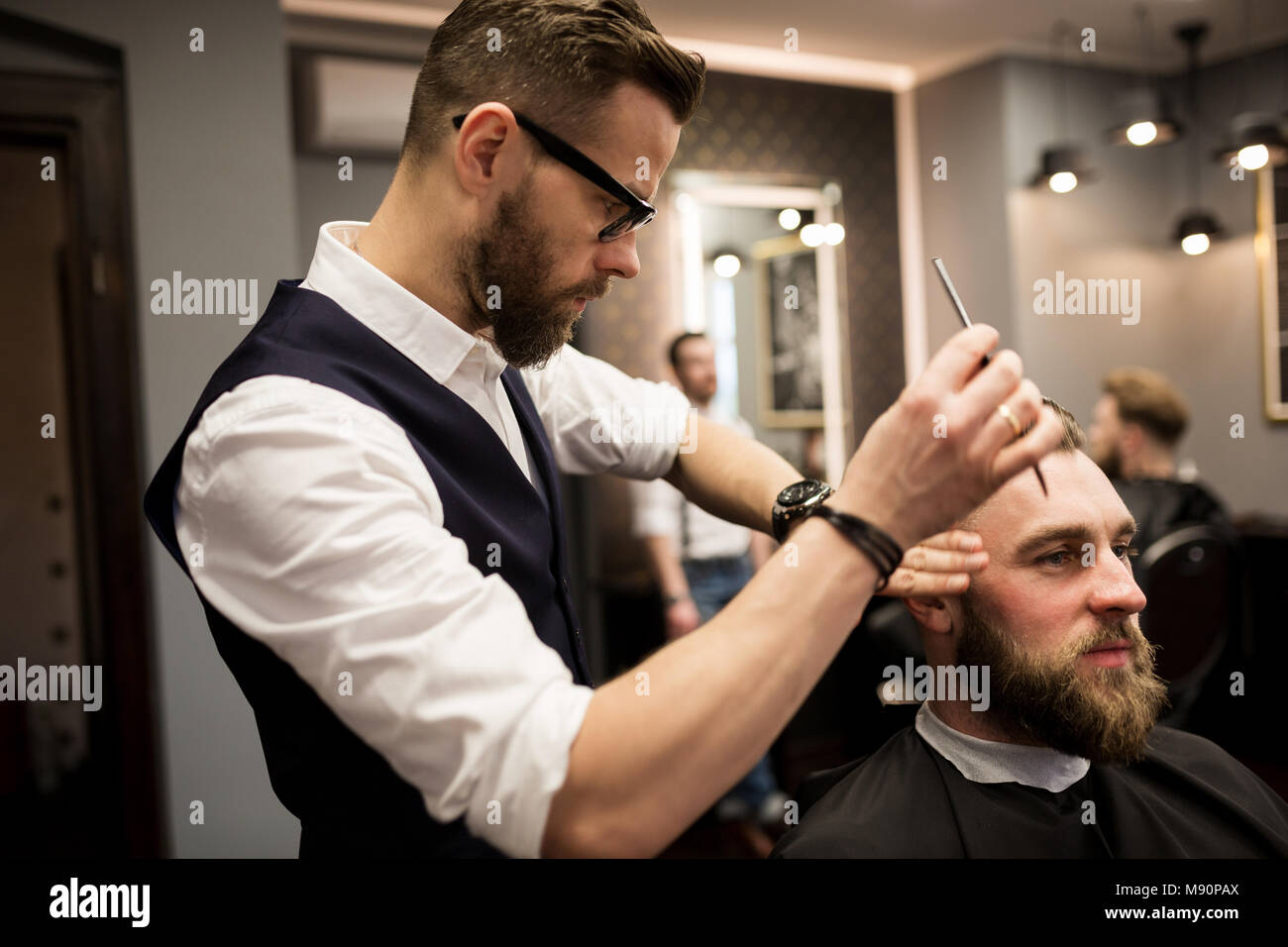 Inside busy barber shop hi-res stock photography and images - Alamy