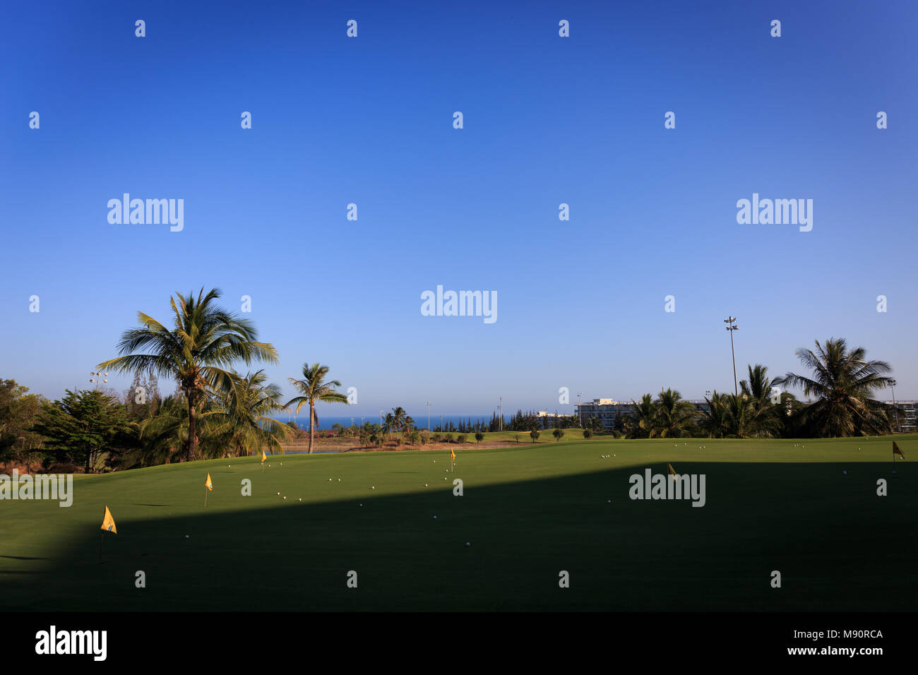 beautiful golf course at the ocean side at sunset, sunrise time ...