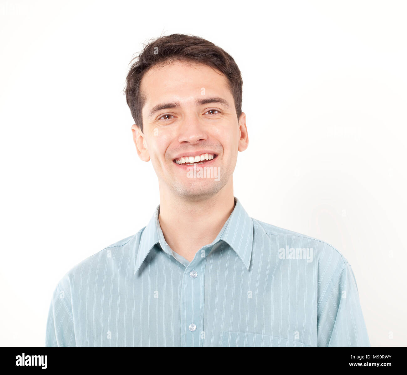 Intellectual man looking to camera and smiling Stock Photo - Alamy