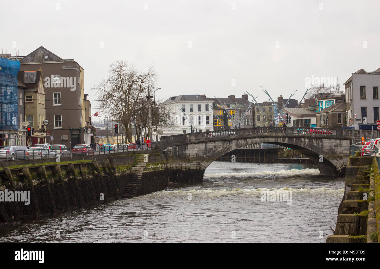 Parliament Bridge and the narrow streets of Cork Ireland on the Father ...