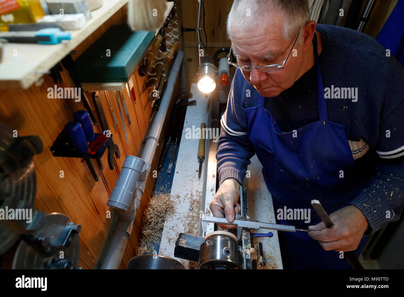 Man working on a wood lathe Stock Photo - Alamy